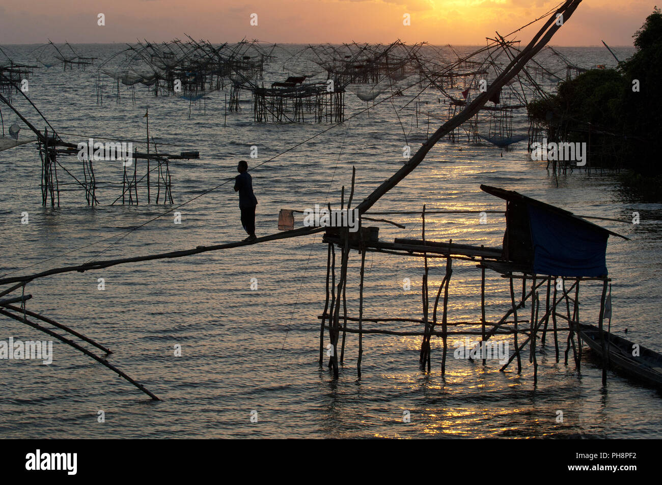 Shore-operated lift net - Sunrise - Fisherman - Phatthalung - Southern ...