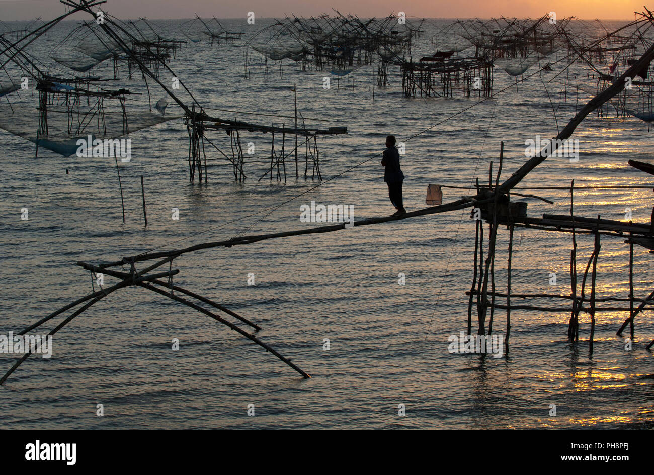Shore-operated lift net - Sunrise - Fisherman - Phatthalung - Southern ...