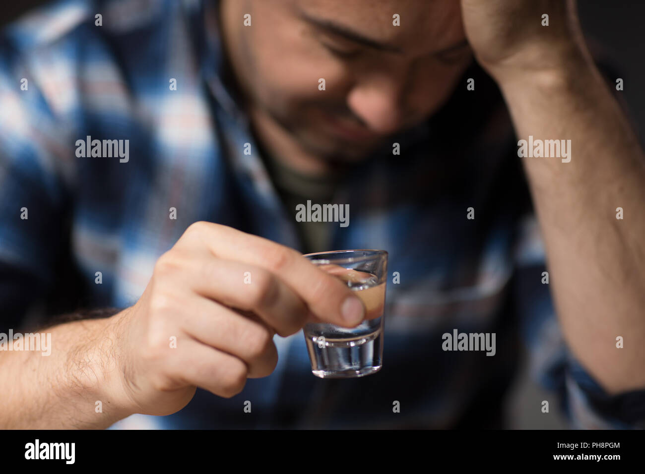 Alcohol abuse drunk man vodka hi-res stock photography and images - Alamy