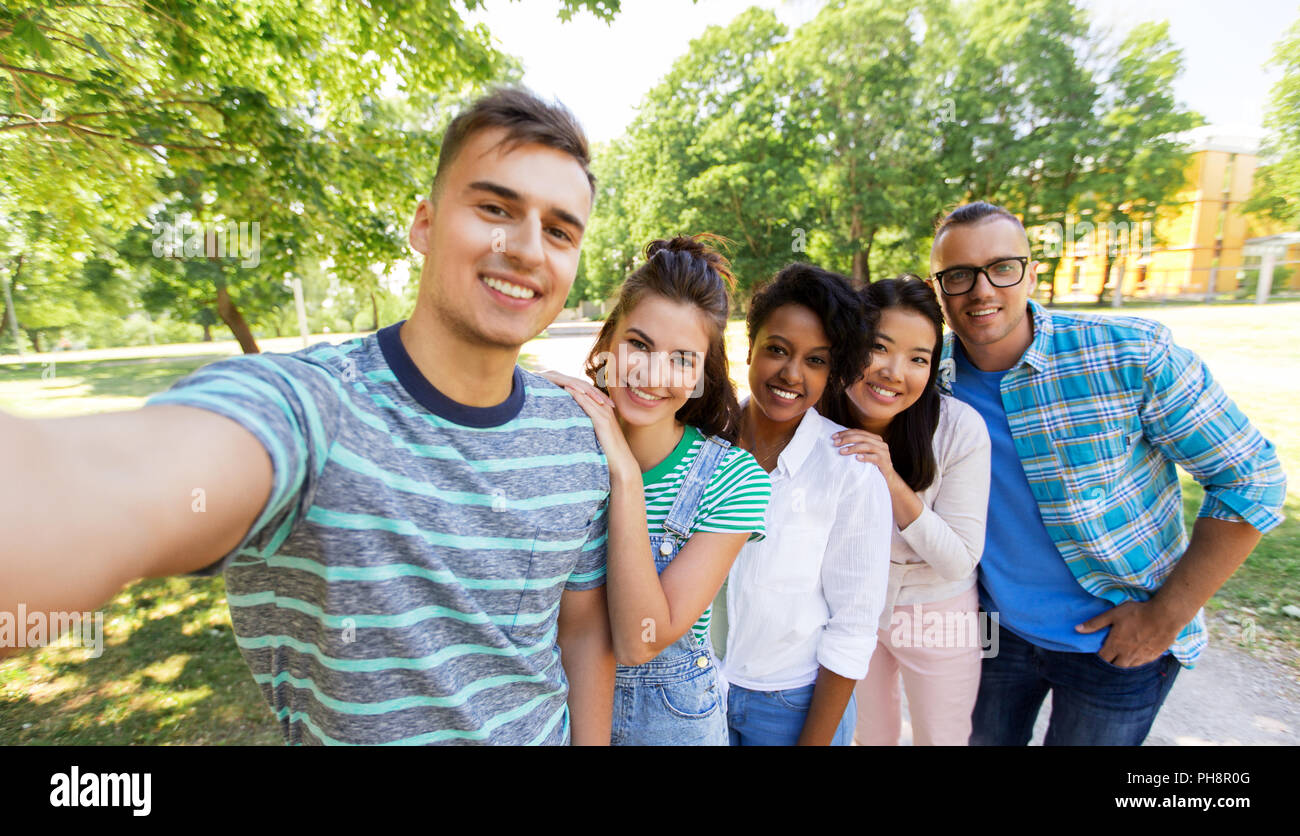 group of happy international friends taking selfie Stock Photo - Alamy