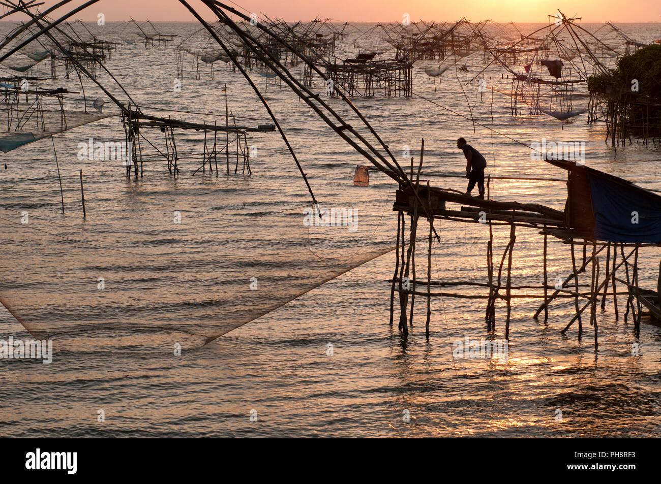 Shore-operated lift net - Sunrise - Fisherman - Phatthalung - Southern ...