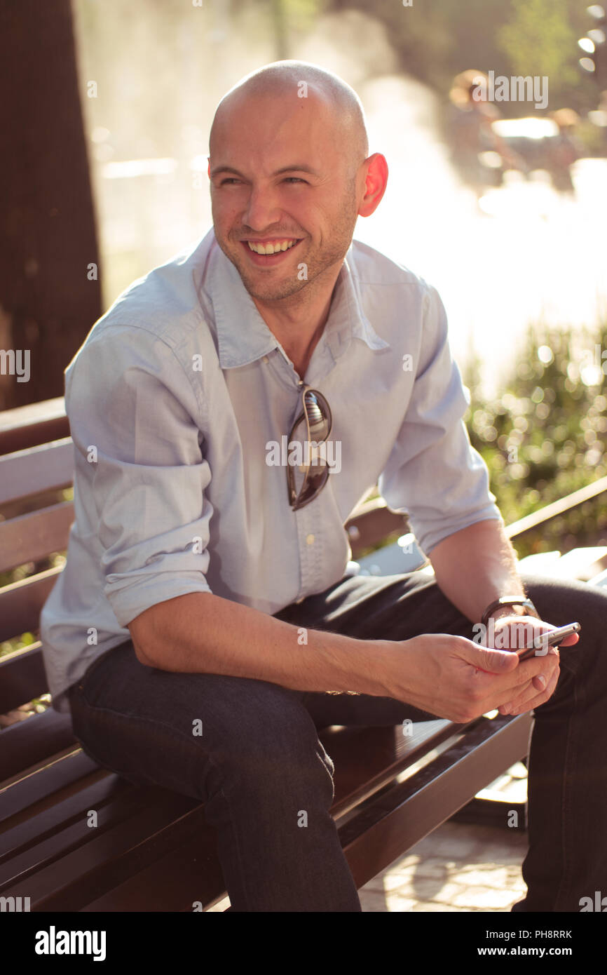 Handsome young man laughing hi-res stock photography and images - Alamy