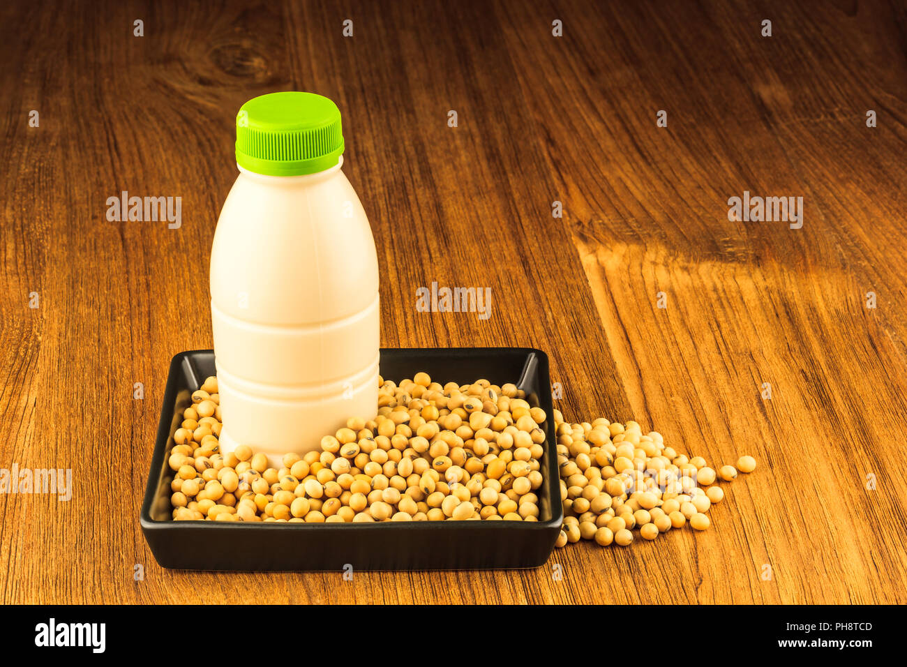 Soybean and a bottle of soybean milk Stock Photo - Alamy