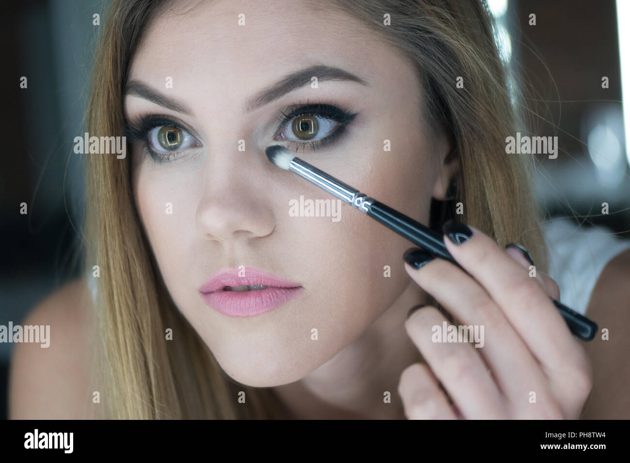 Close up female applying hi-res stock photography and images - Alamy