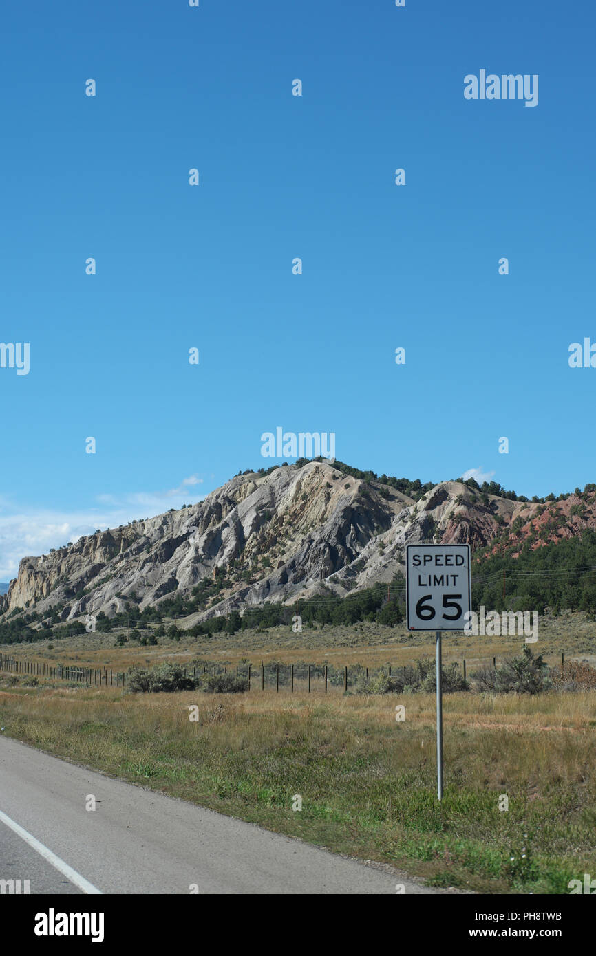 speed limit sign on the road colorado Stock Photo - Alamy