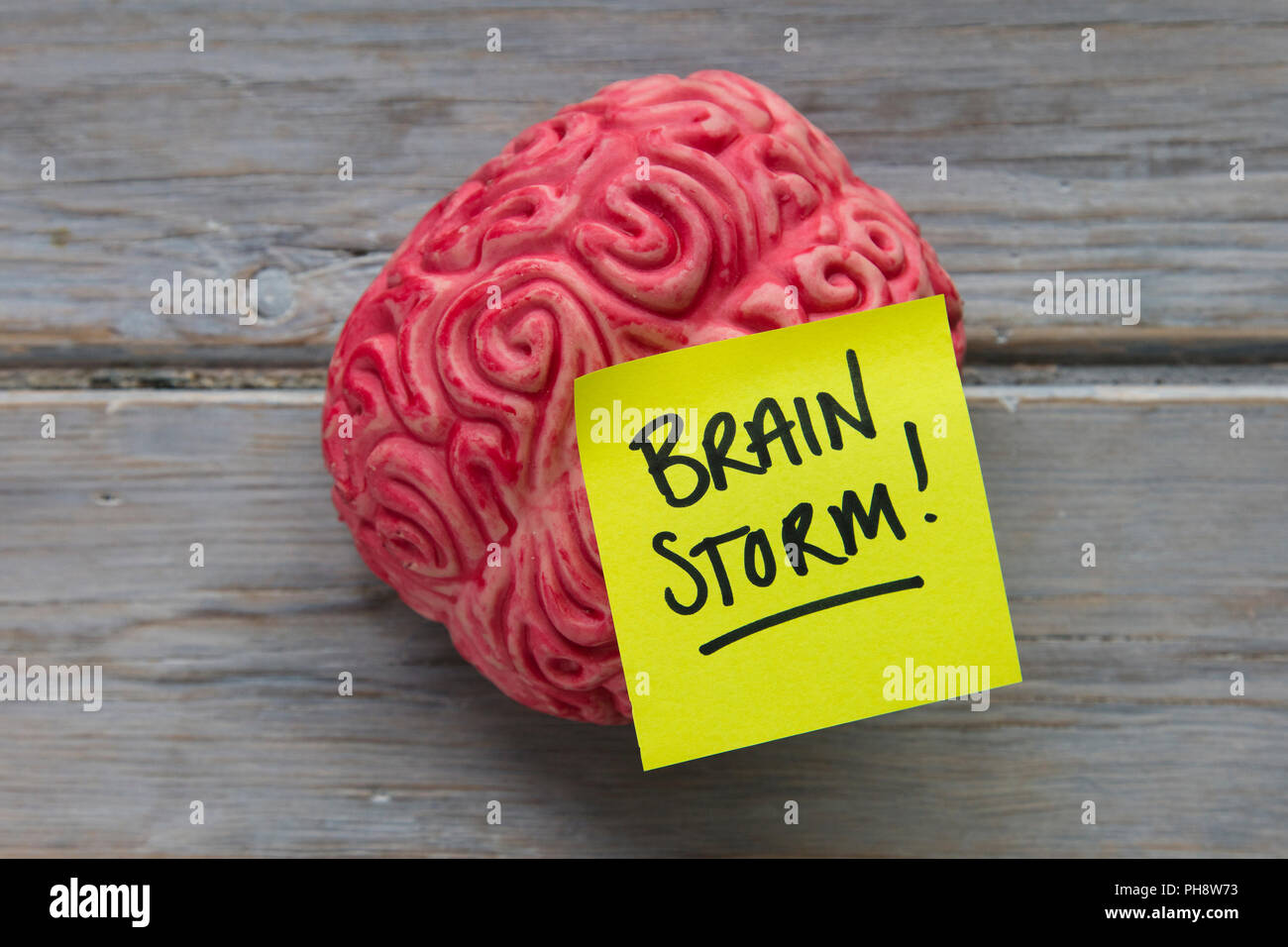Brainstom label stuck on a brain Stock Photo - Alamy