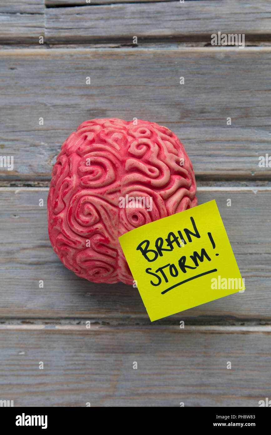Brainstom label stuck on a brain Stock Photo - Alamy