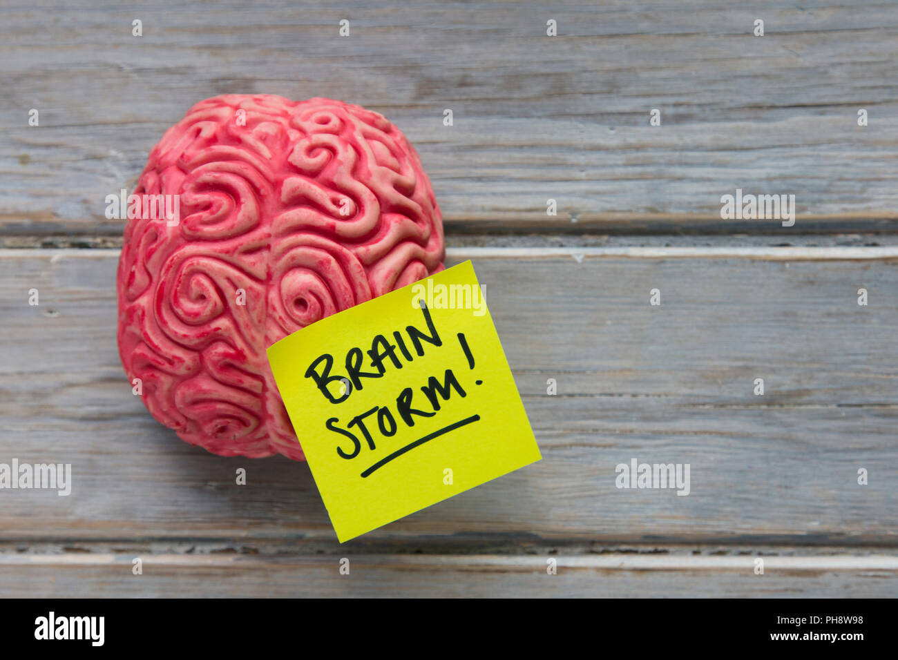 Brainstom label stuck on a brain Stock Photo - Alamy