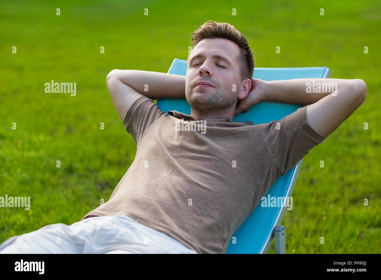 Hand resting on arm chair hi-res stock photography and images - Alamy