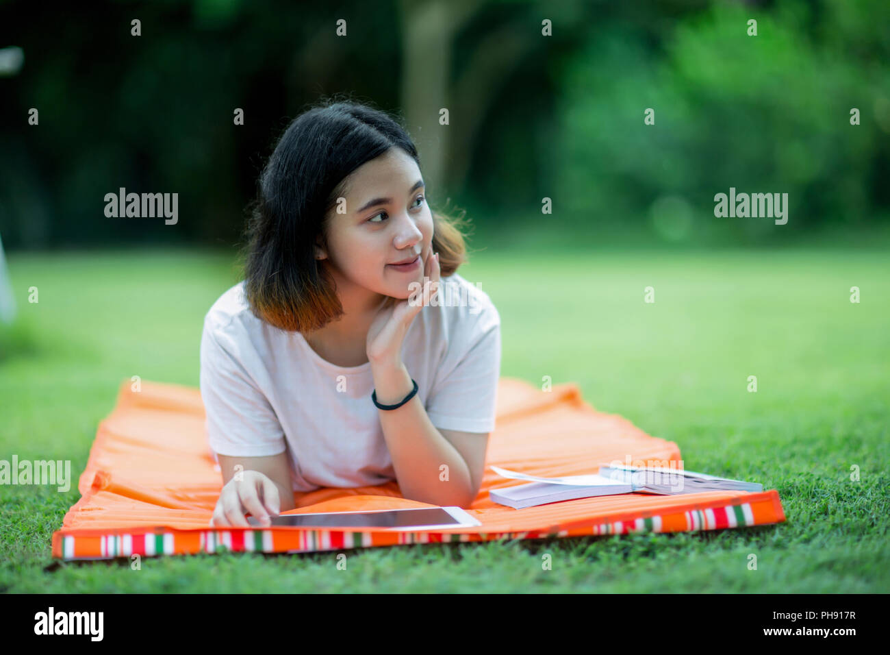 Prone woman hi-res stock photography and images - Alamy