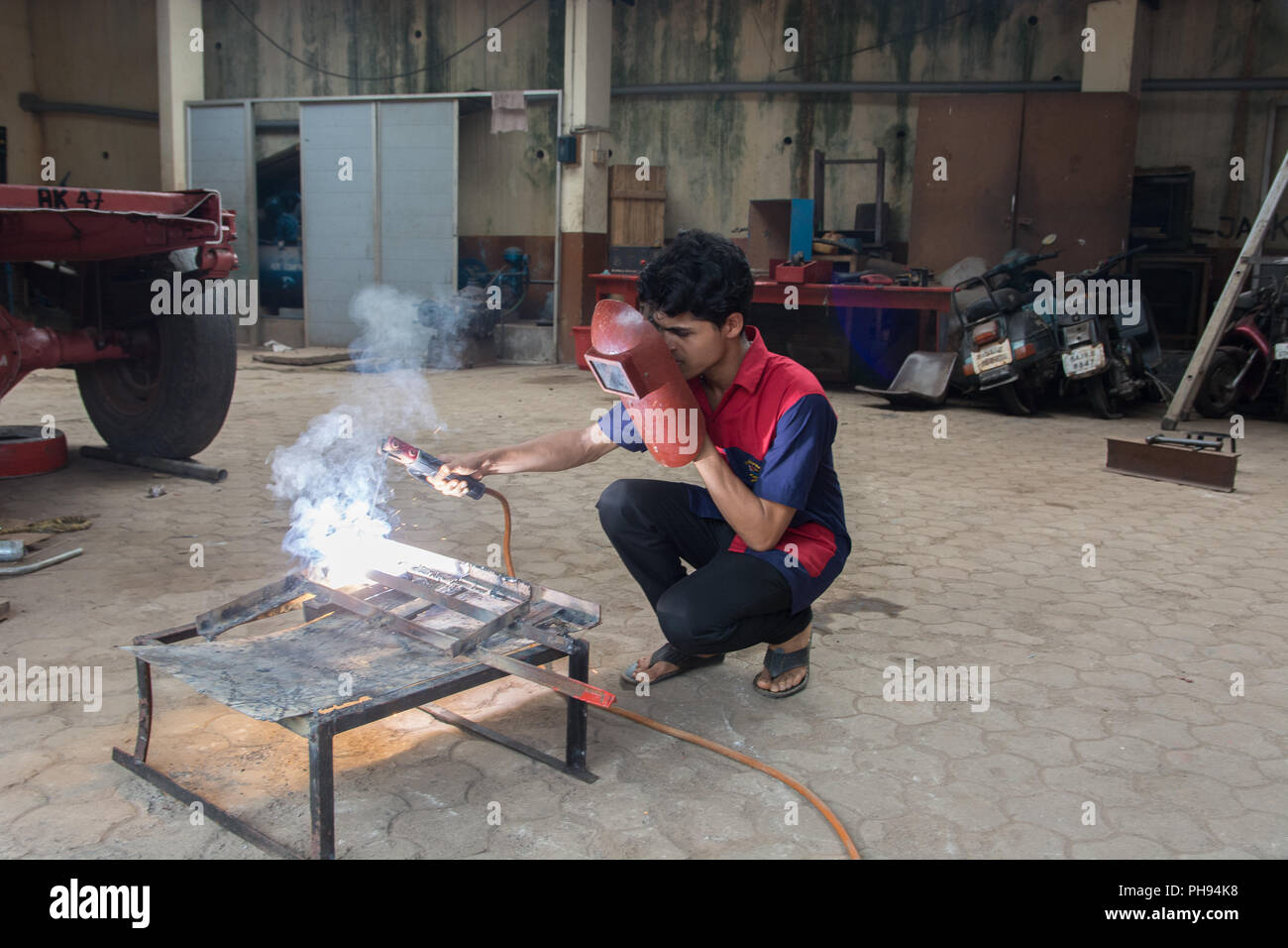 Mumbai, India - July 8, 2018 - Indian boys learning about welding in vocational school Stock ...