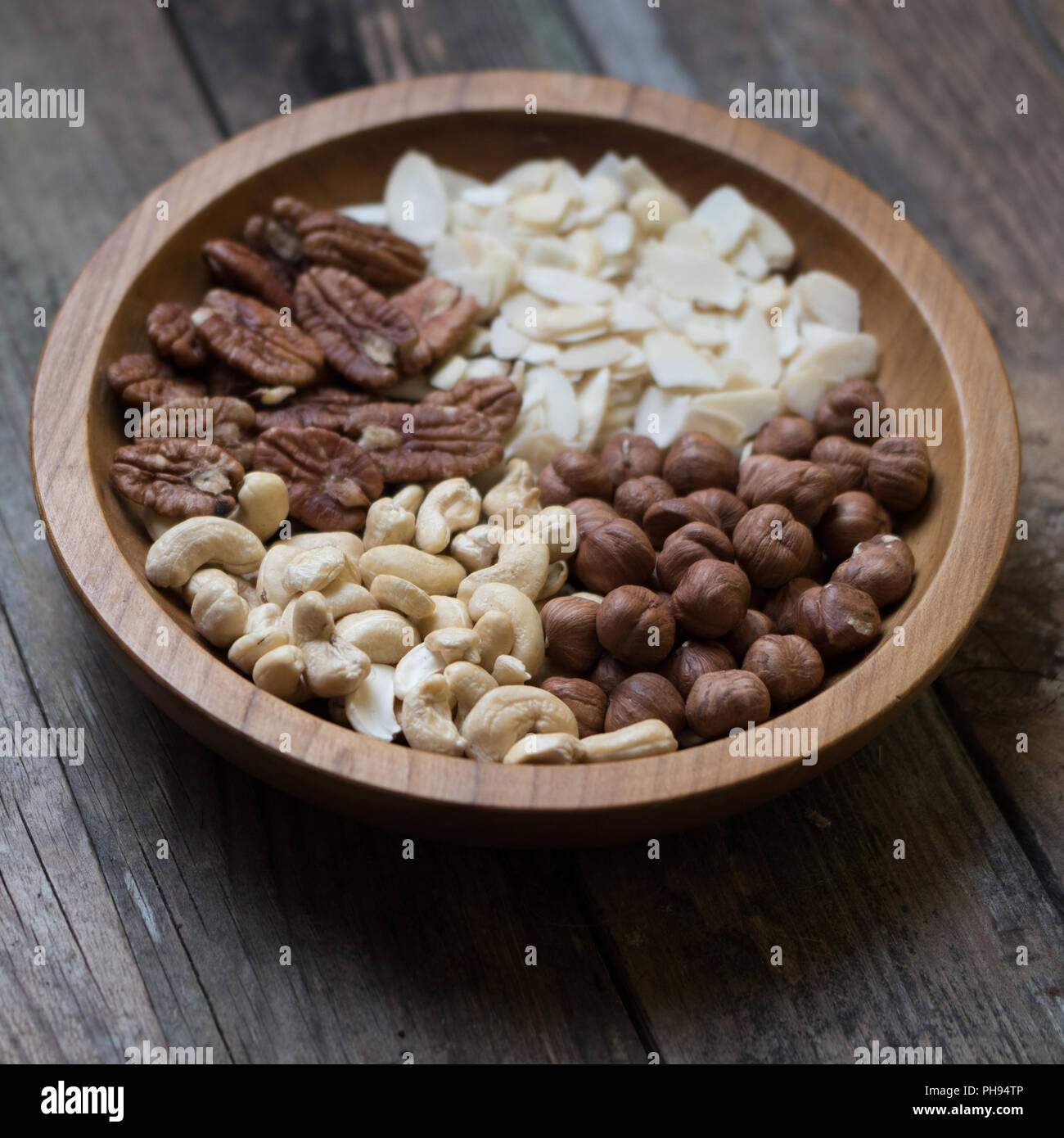 mix of 4 different nuts Stock Photo - Alamy