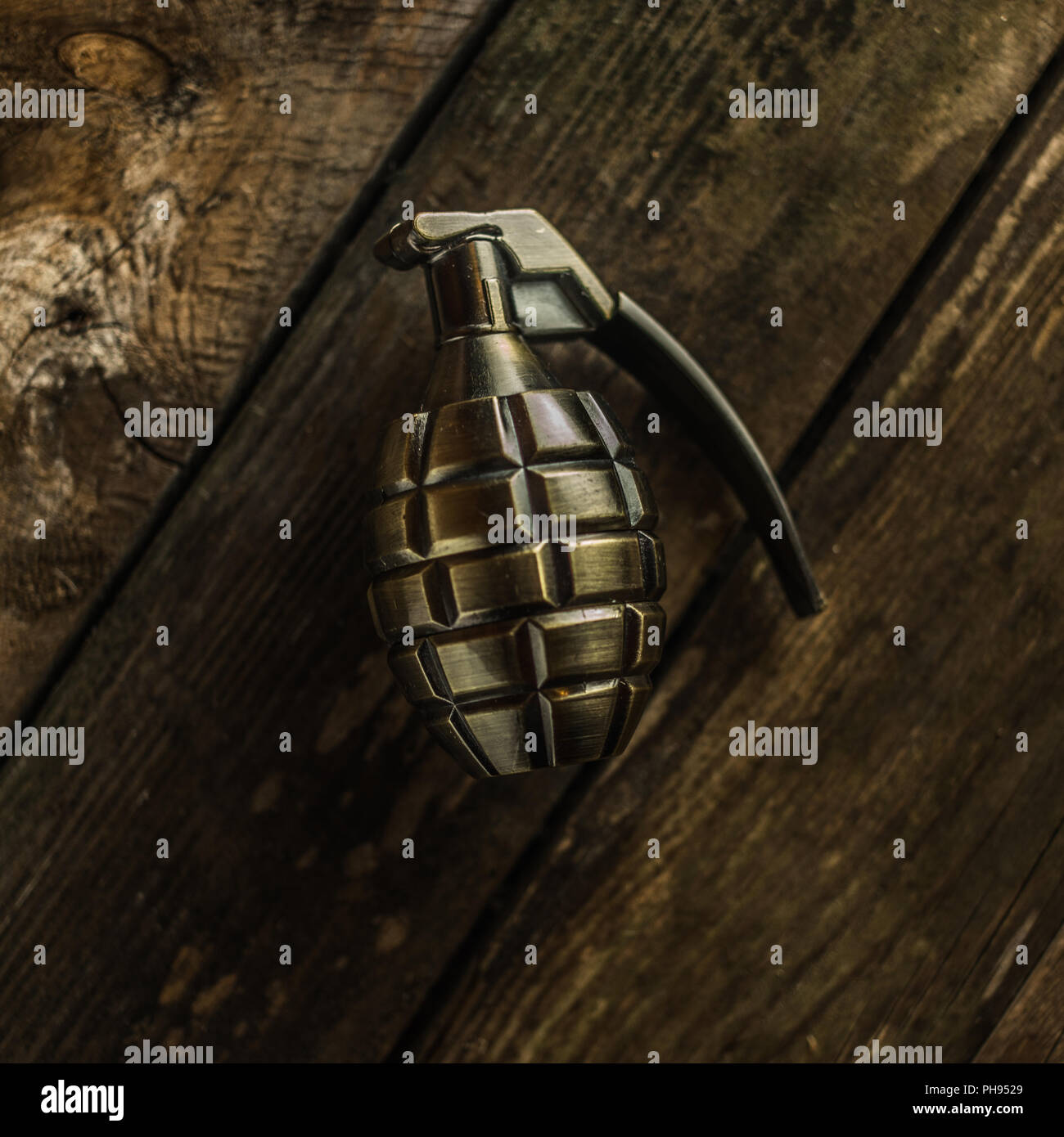 hand grenade on wood Stock Photo - Alamy