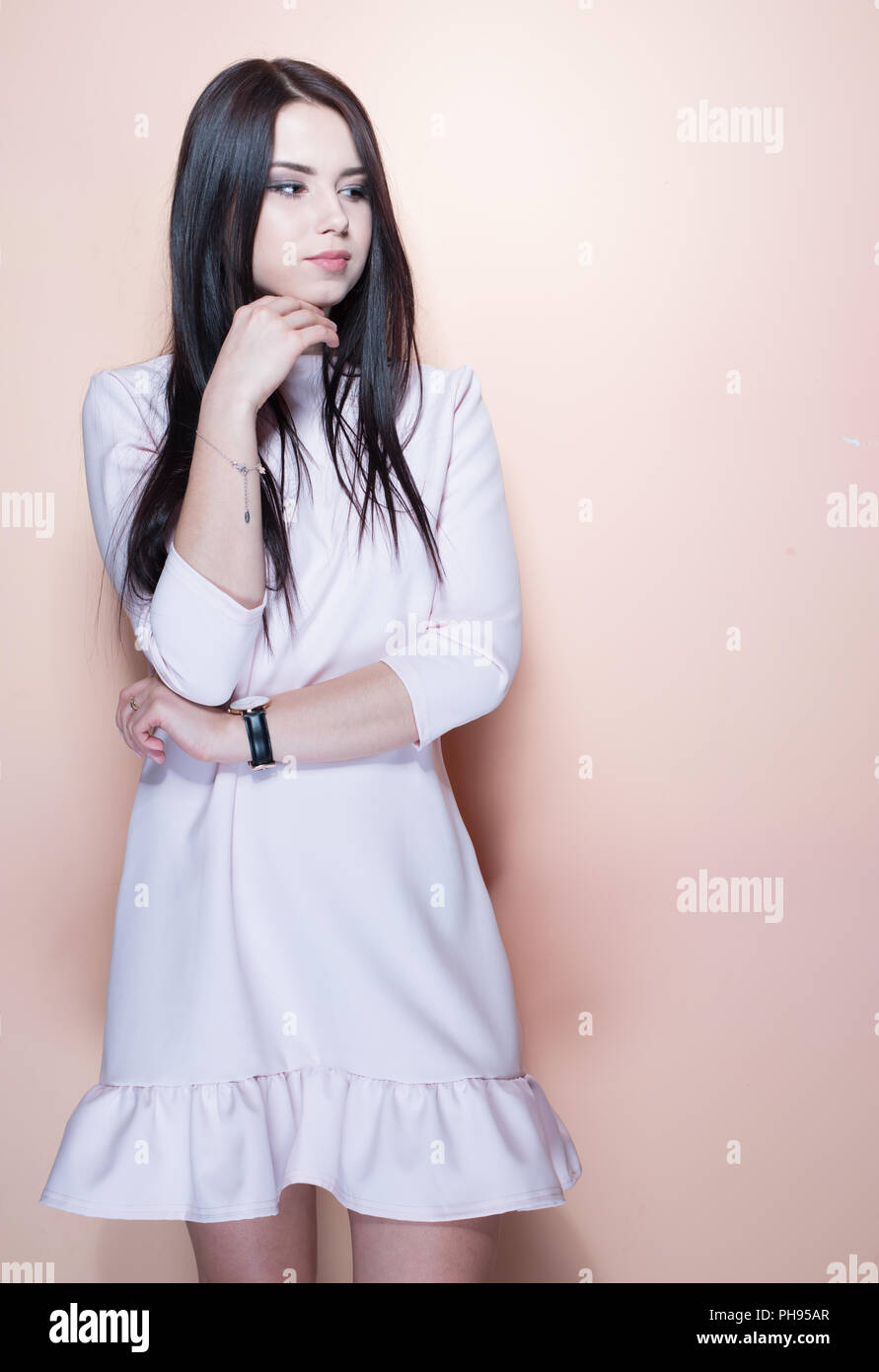 attractive teenage girl thinking Stock Photo - Alamy