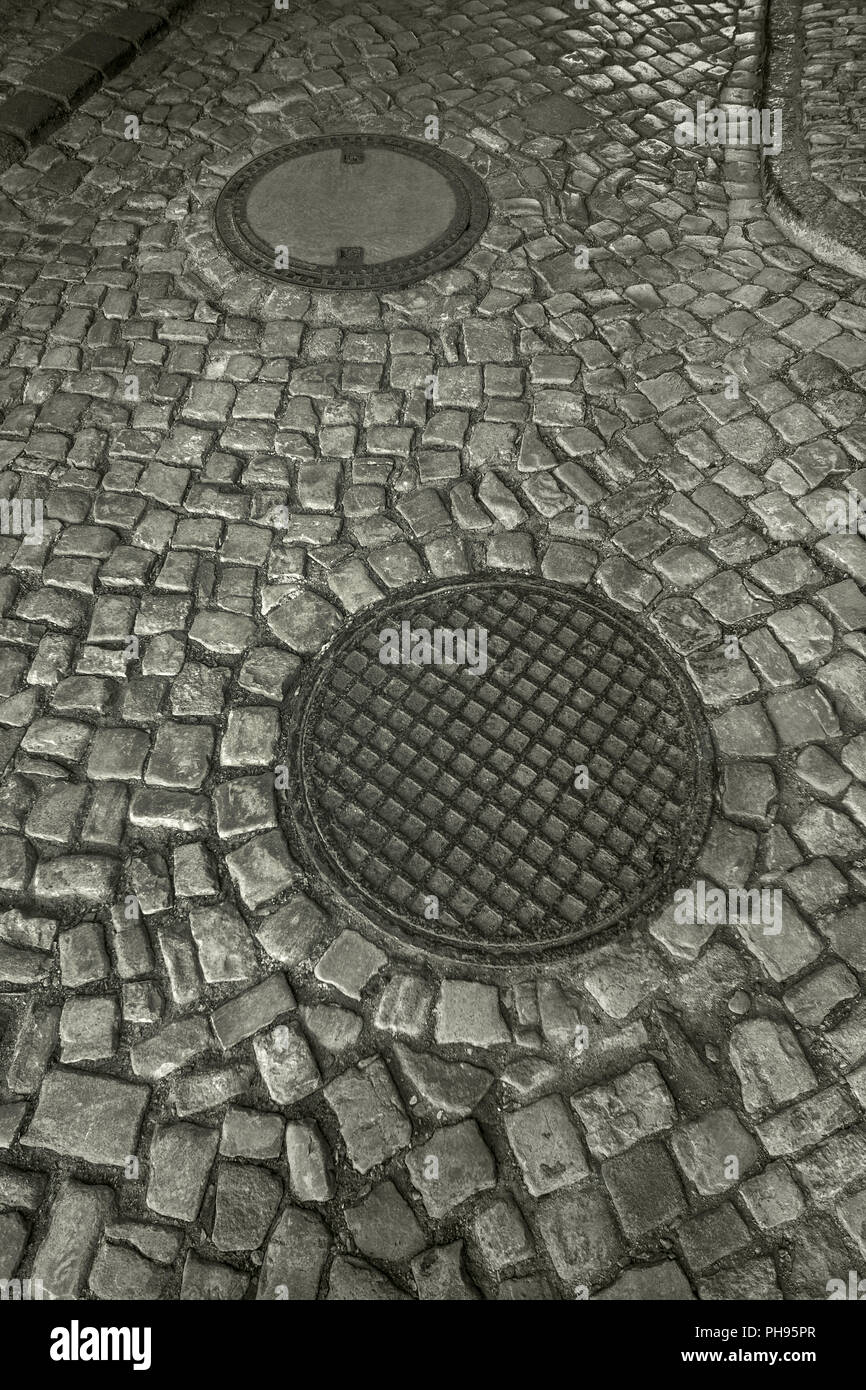 Paved road street lane cobbles hi-res stock photography and images - Alamy