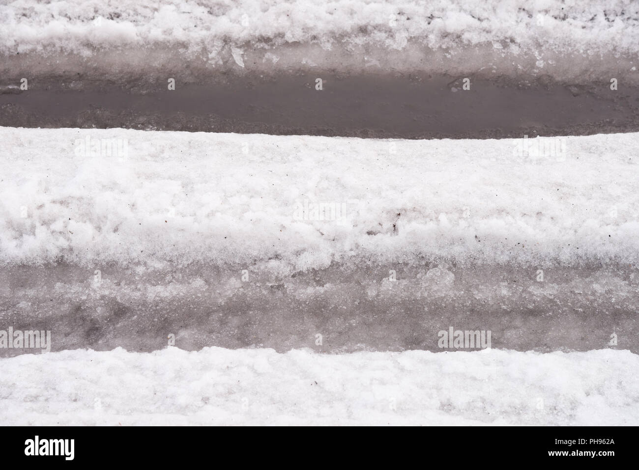 spring road with snow Stock Photo - Alamy