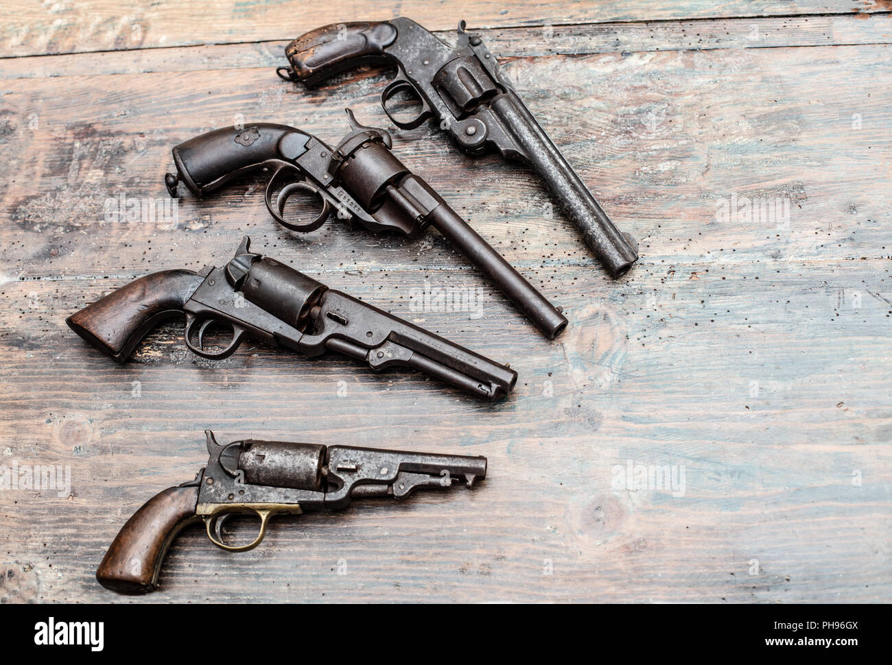 Historic guns in a museum exhibit or collectors showcase displayed on a ...