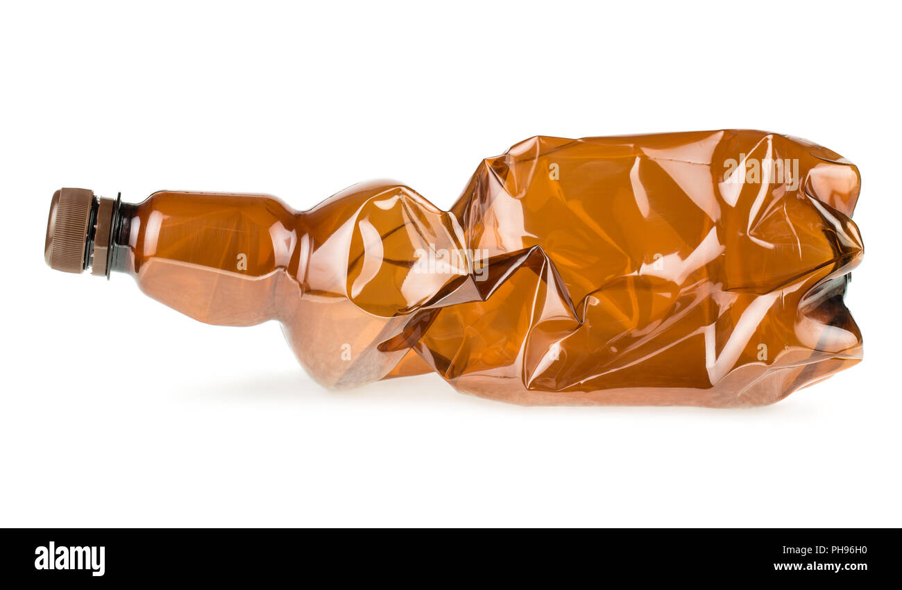 Crumpled brown plastic bottle Stock Photo - Alamy