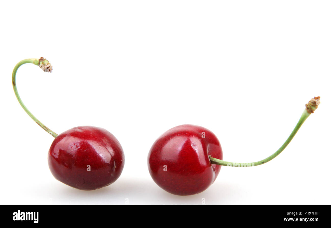 Sweet cherry isolated on white Stock Photo - Alamy