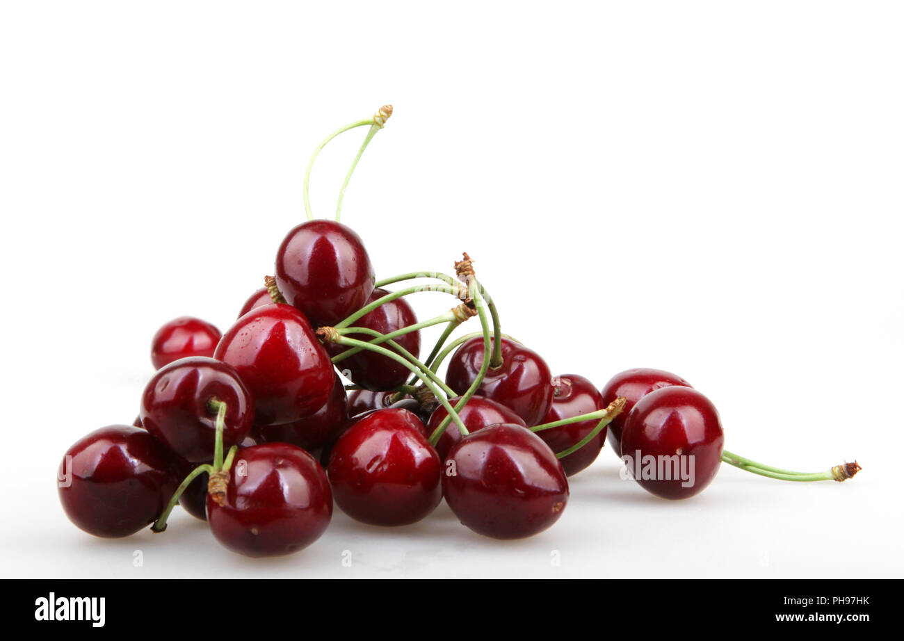 Sweet cherry isolated on white Stock Photo - Alamy