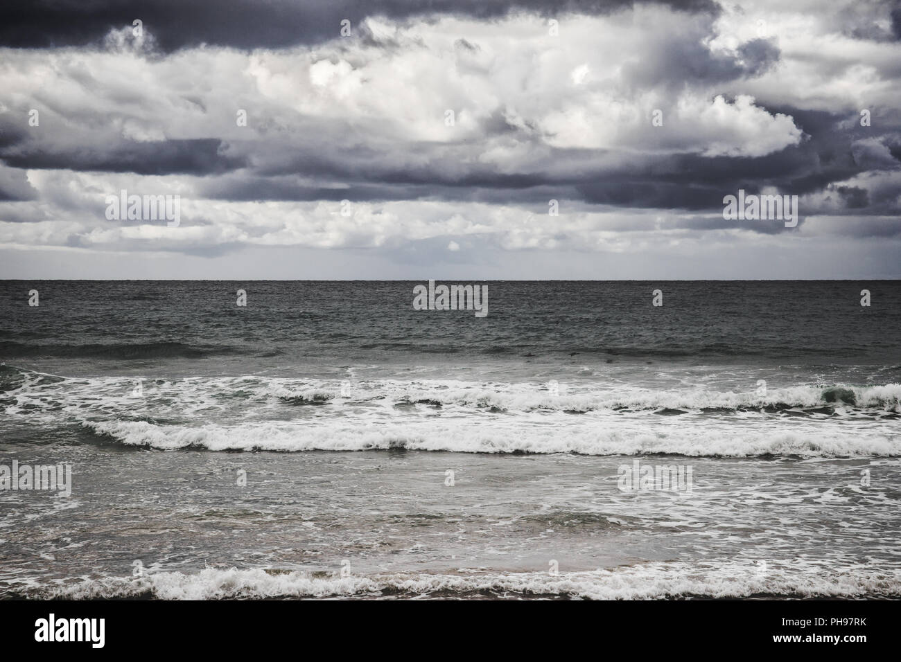 Overcast sky over ocean in New Zealand Stock Photo - Alamy