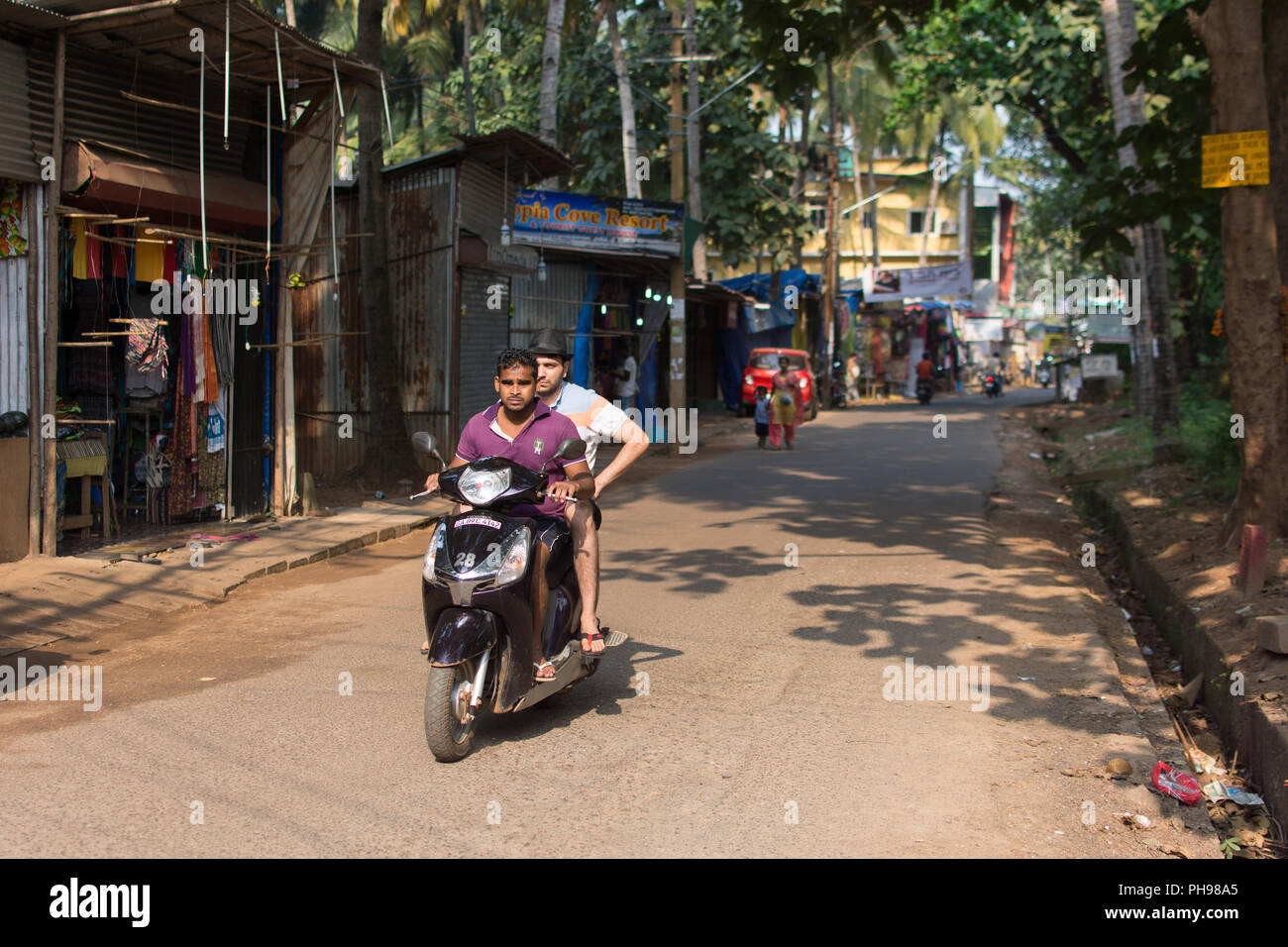 Goa, India - July 8, 2018 - Scooter on indian street in Goa Stock Photo ...