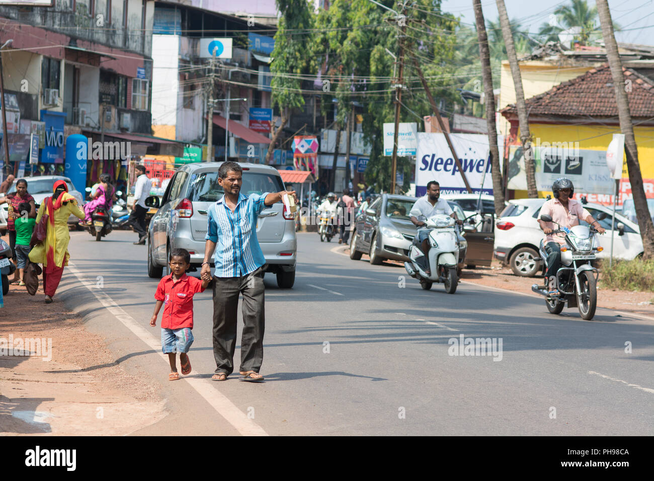 Indian boy on moped in street india hi-res stock photography and images ...