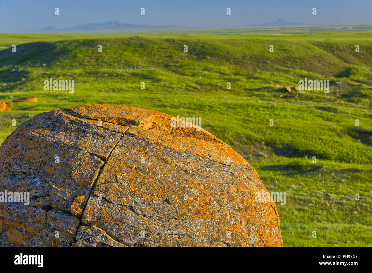 Round orange boulder Stock Photo - Alamy