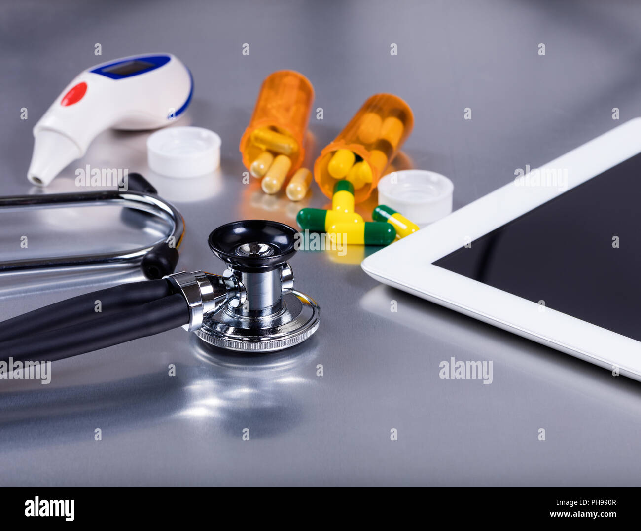 Medical equipment and medicine on stainless steel exam table Stock ...