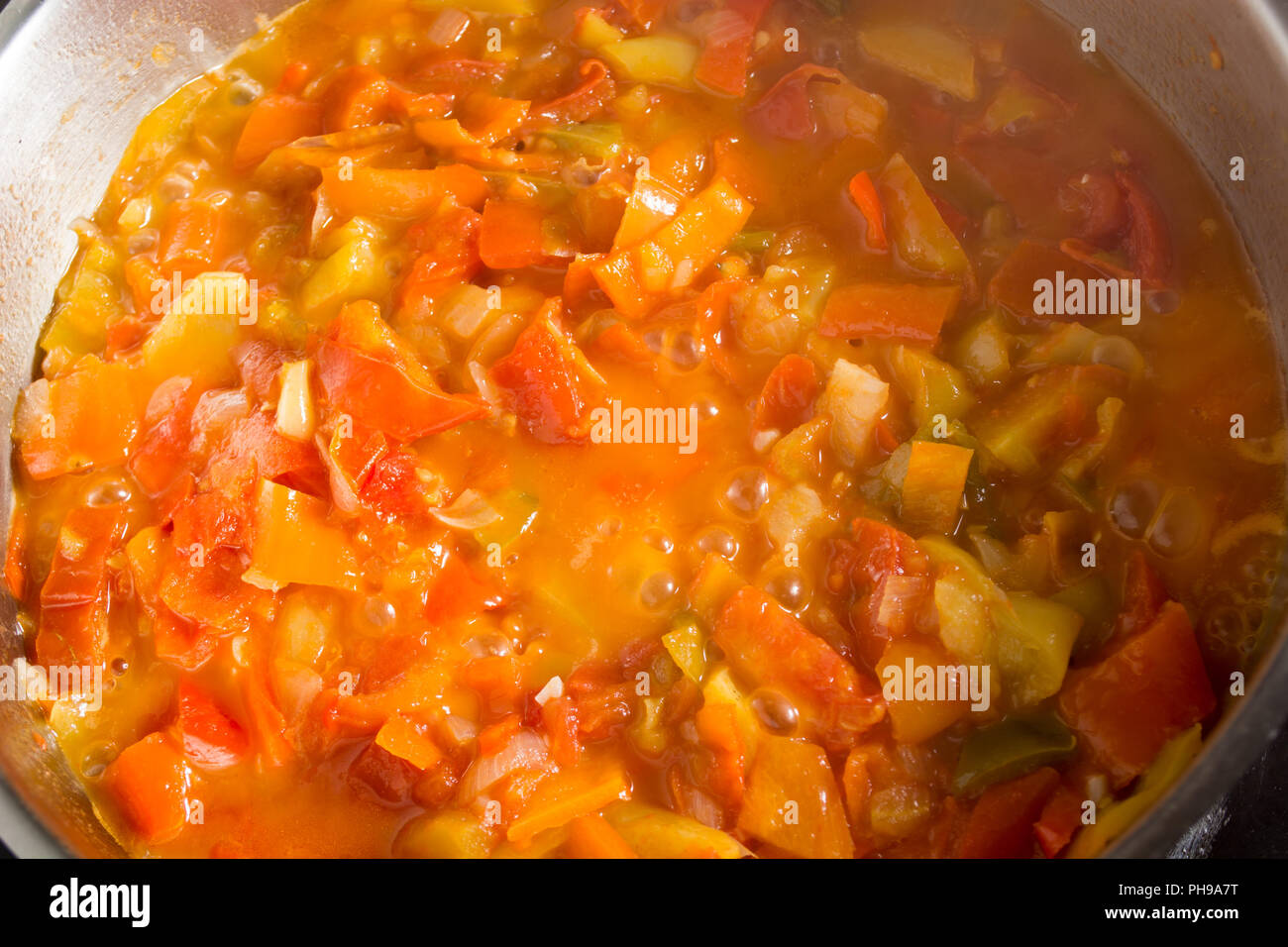 Cooking stew with mixed and colorfull vegetables Stock Photo - Alamy