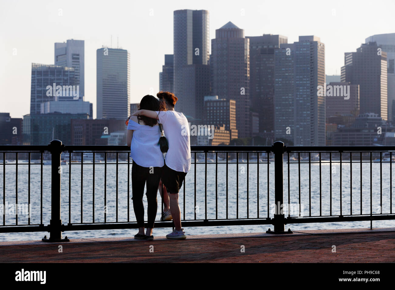 Couple, Boston Harbor waterfront, Piers, Boston Massachusetts USA Stock ...