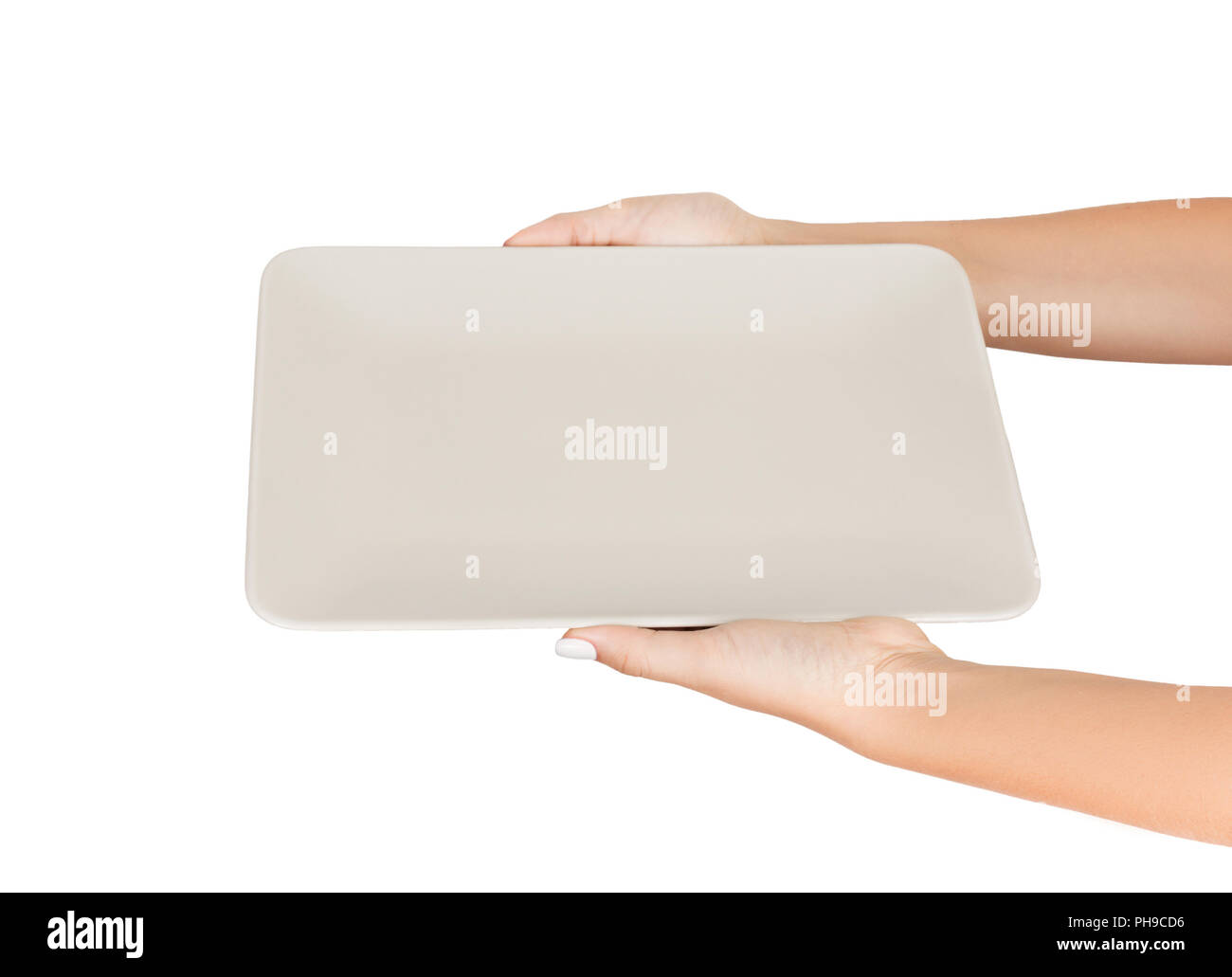 Blank white matte rectangular plate in female hand. perspective view ...