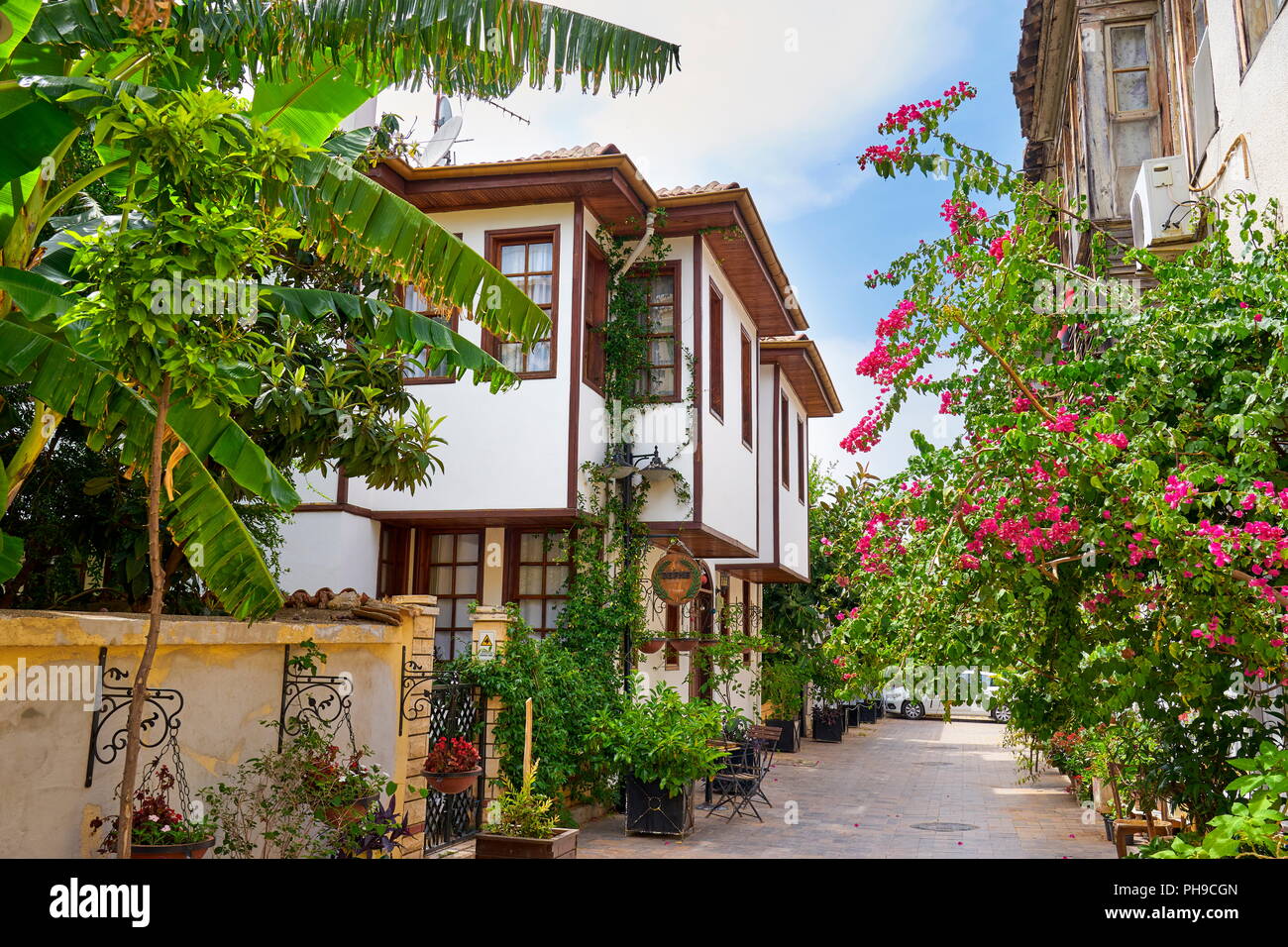 Blooming flowers at Kaleici old town streets, Antalya, Turkey Stock ...