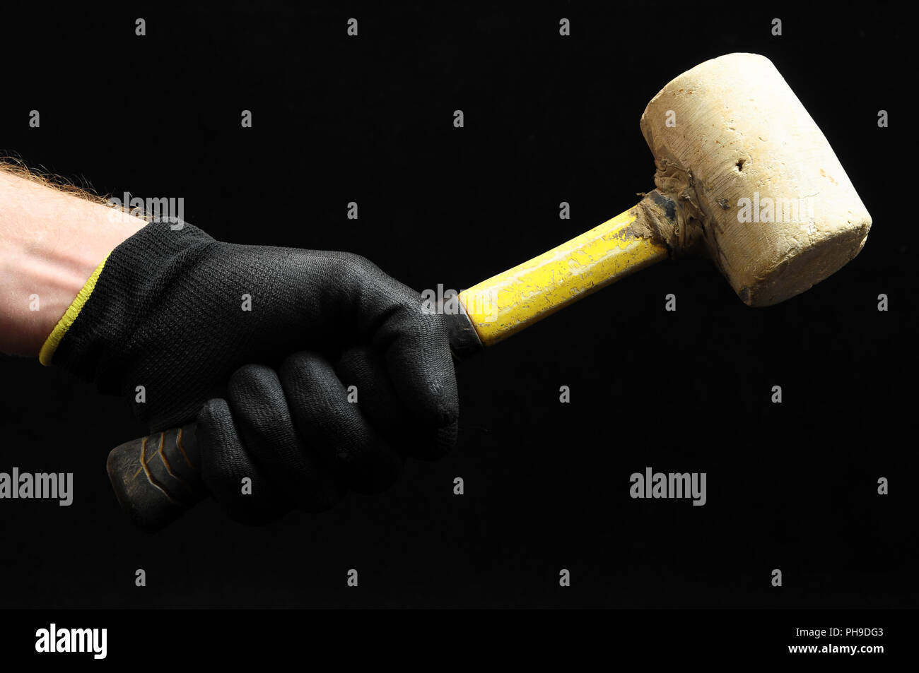 Hammer and a Hand Stock Photo - Alamy