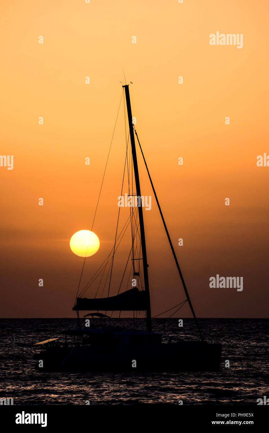 Sail Boat Silhouette at Sunset Stock Photo - Alamy