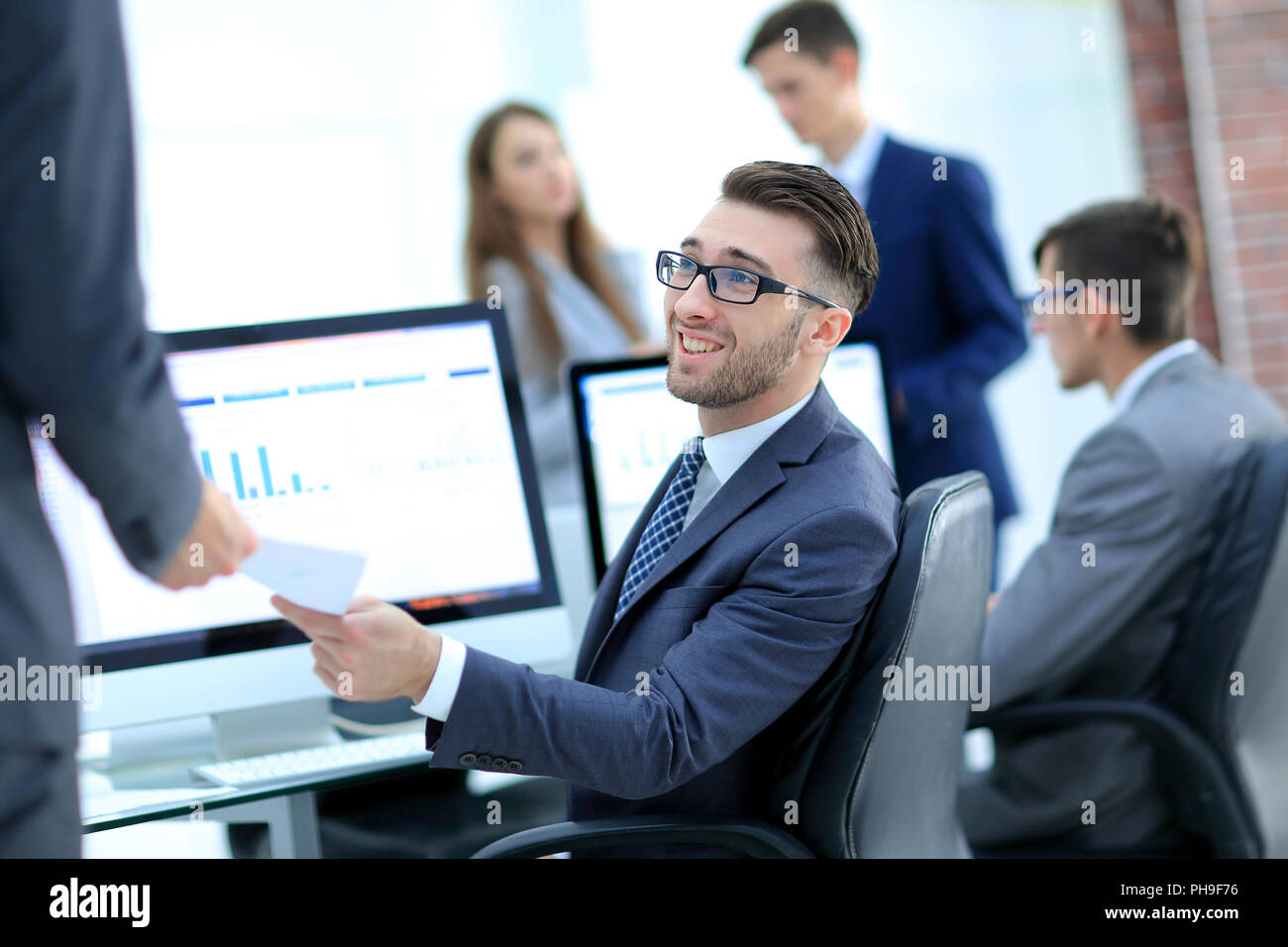 businessman working on a computer on business reports Stock Photo - Alamy