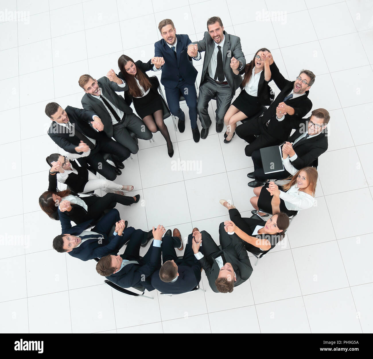 concept of team building .large successful business team sitting in a ...