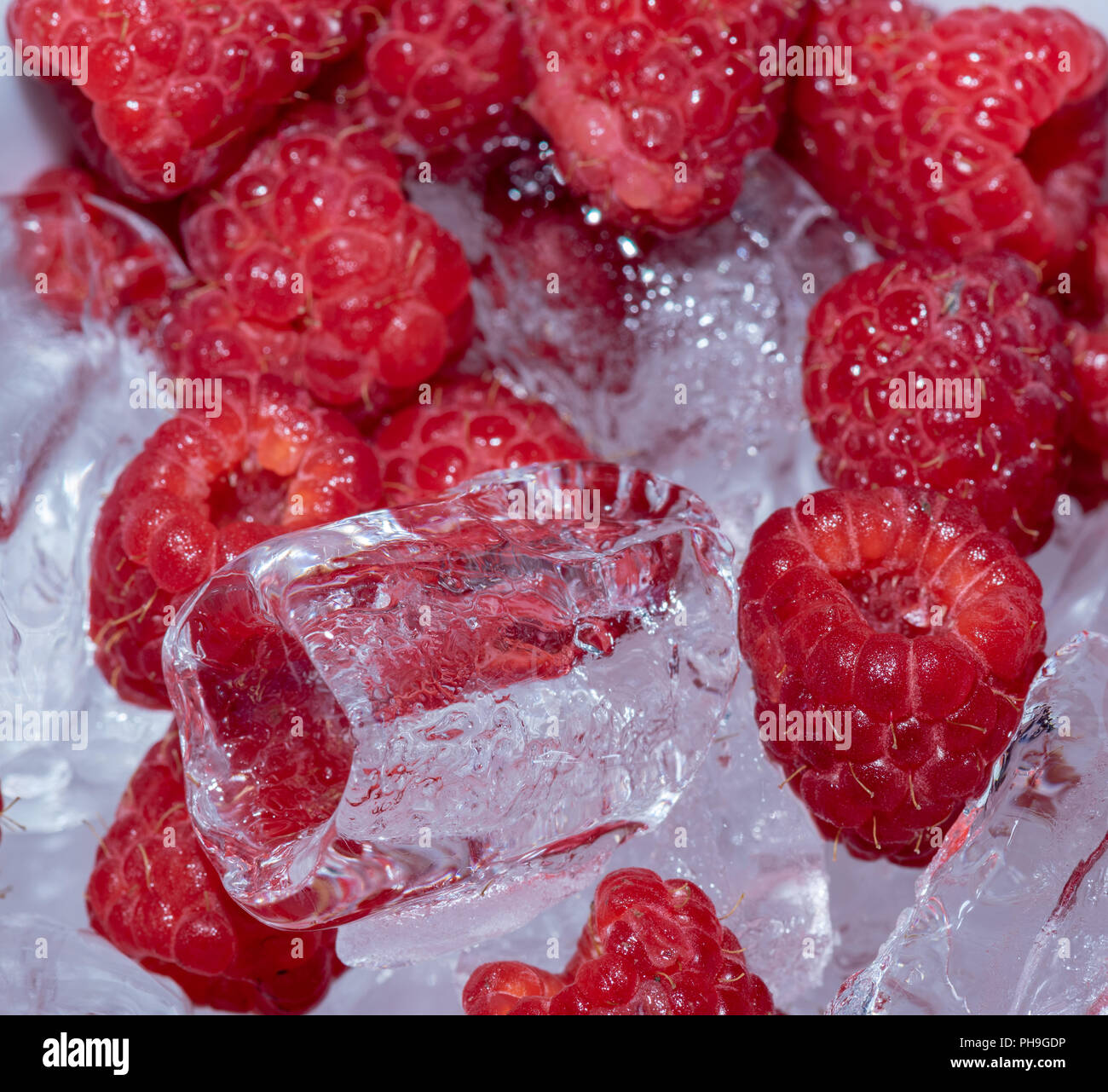 Color macro food photography of a collection of red fresh raspberries ...