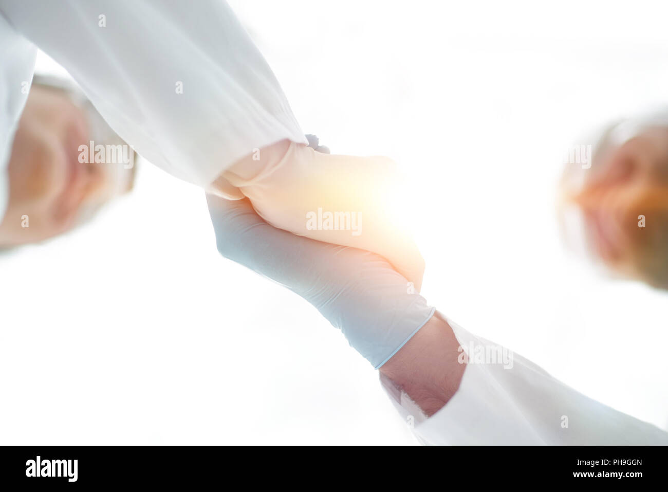 two scientist Shake hands after test completed Stock Photo - Alamy