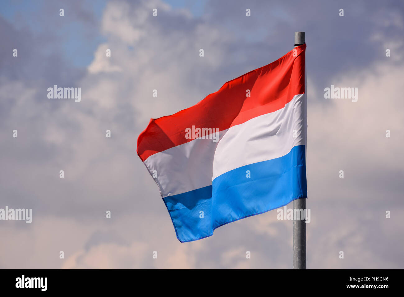 Moving Flag in the Wind Stock Photo - Alamy
