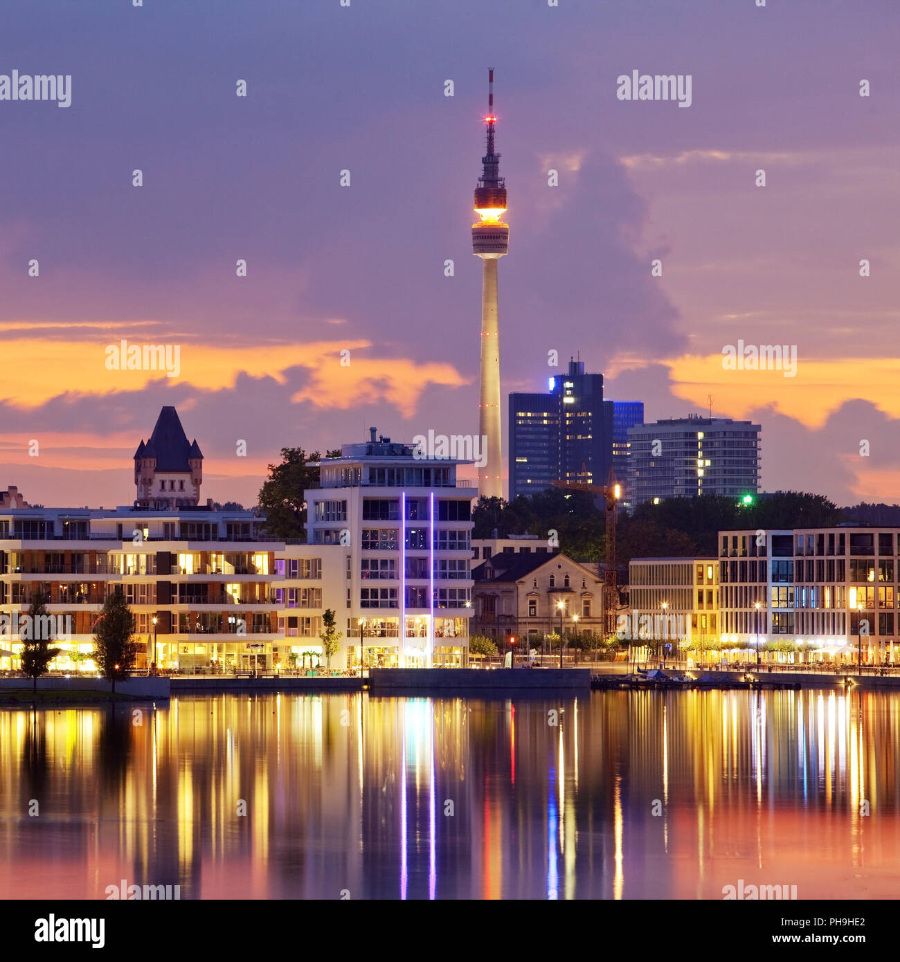 Phoenix Lake with the Florian Tower at sunset twilight, Dortmund, Ruhr ...