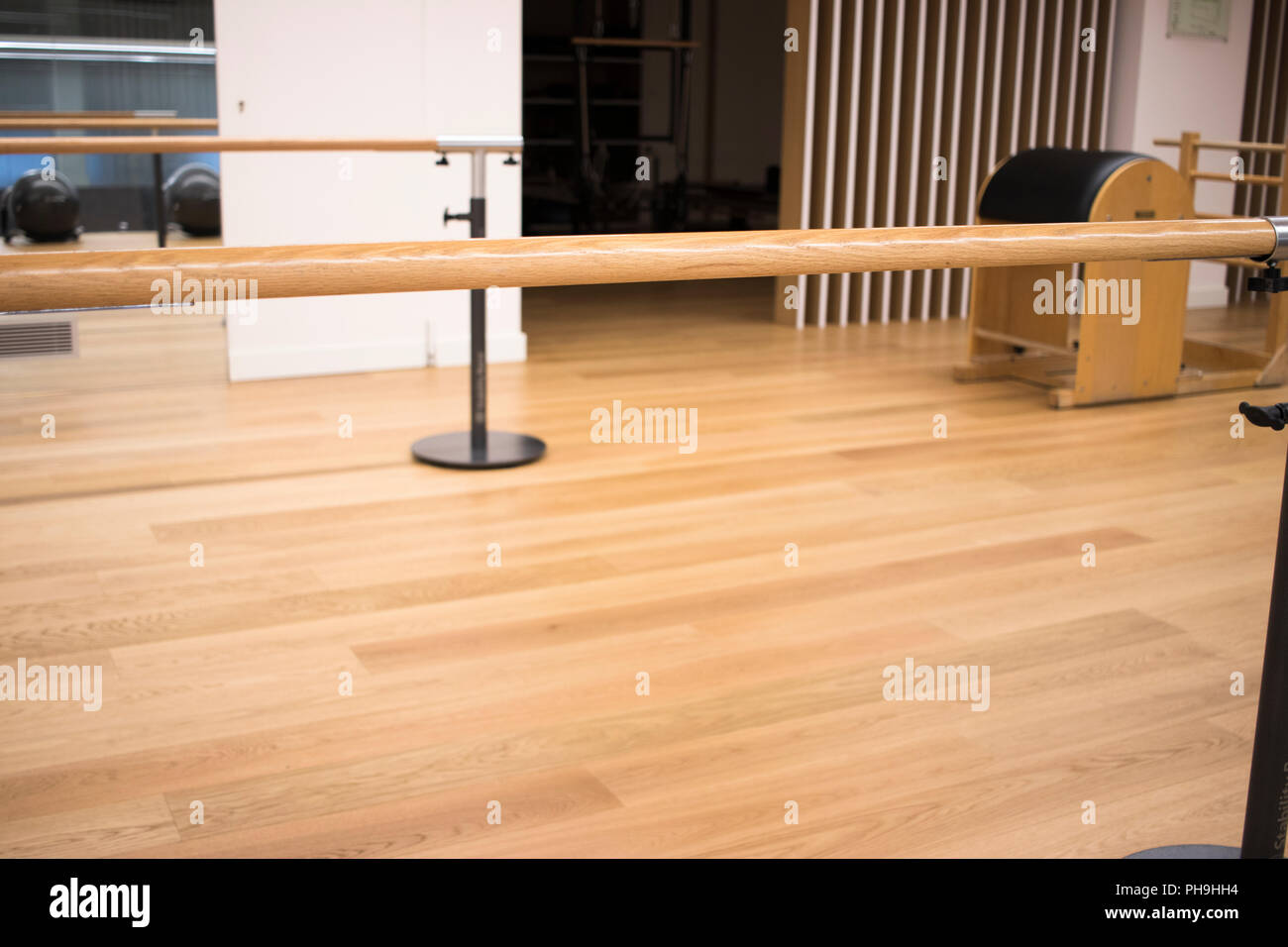 Pilates fitness studio gym room with training dance ballet bar for ...