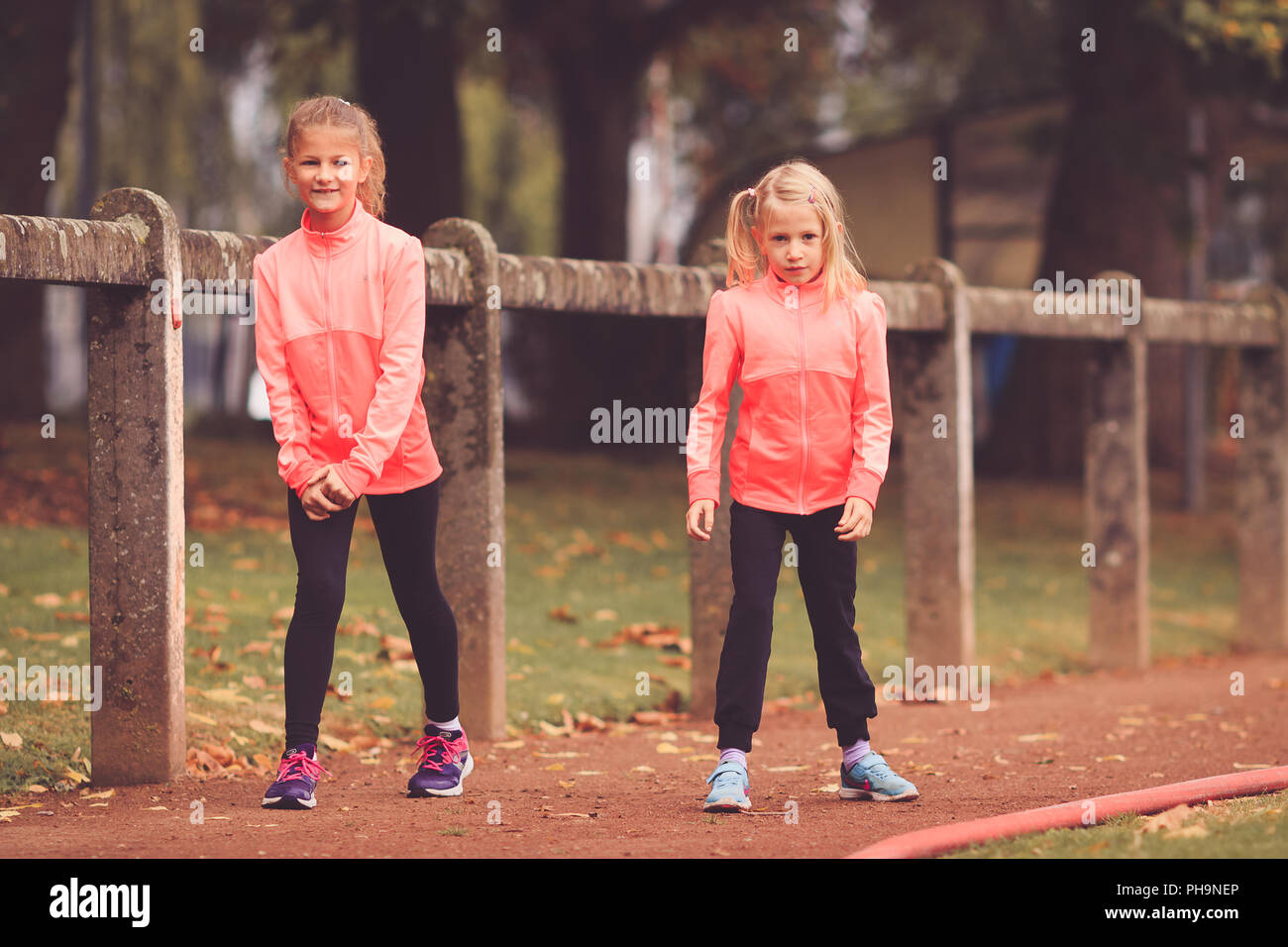 Two young girls waiting to start the race Stock Photo - Alamy