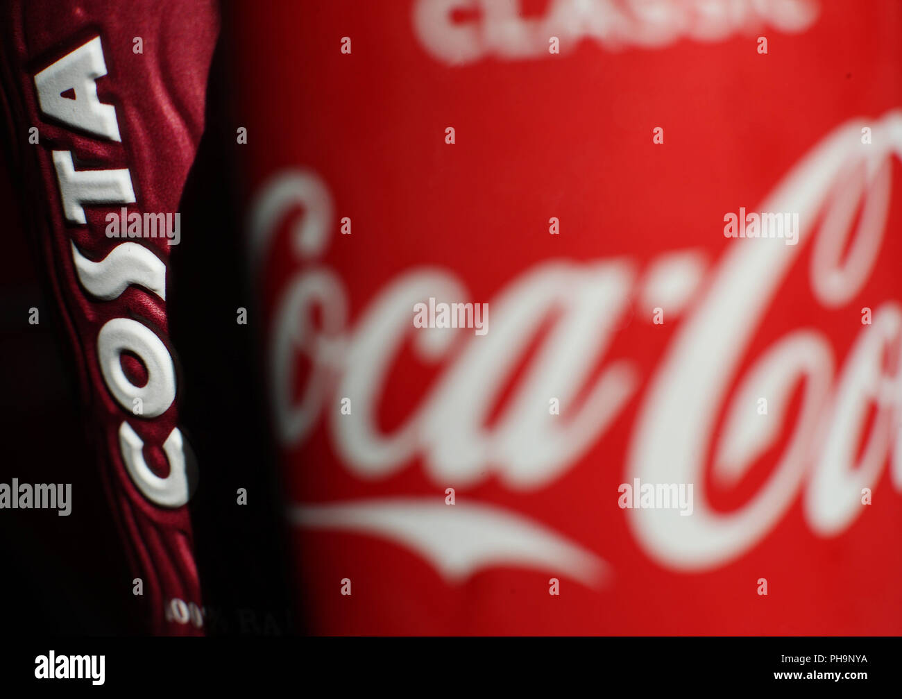 A can of Coca-Cola next to a cup of Costa coffee, as Whitbread has ...