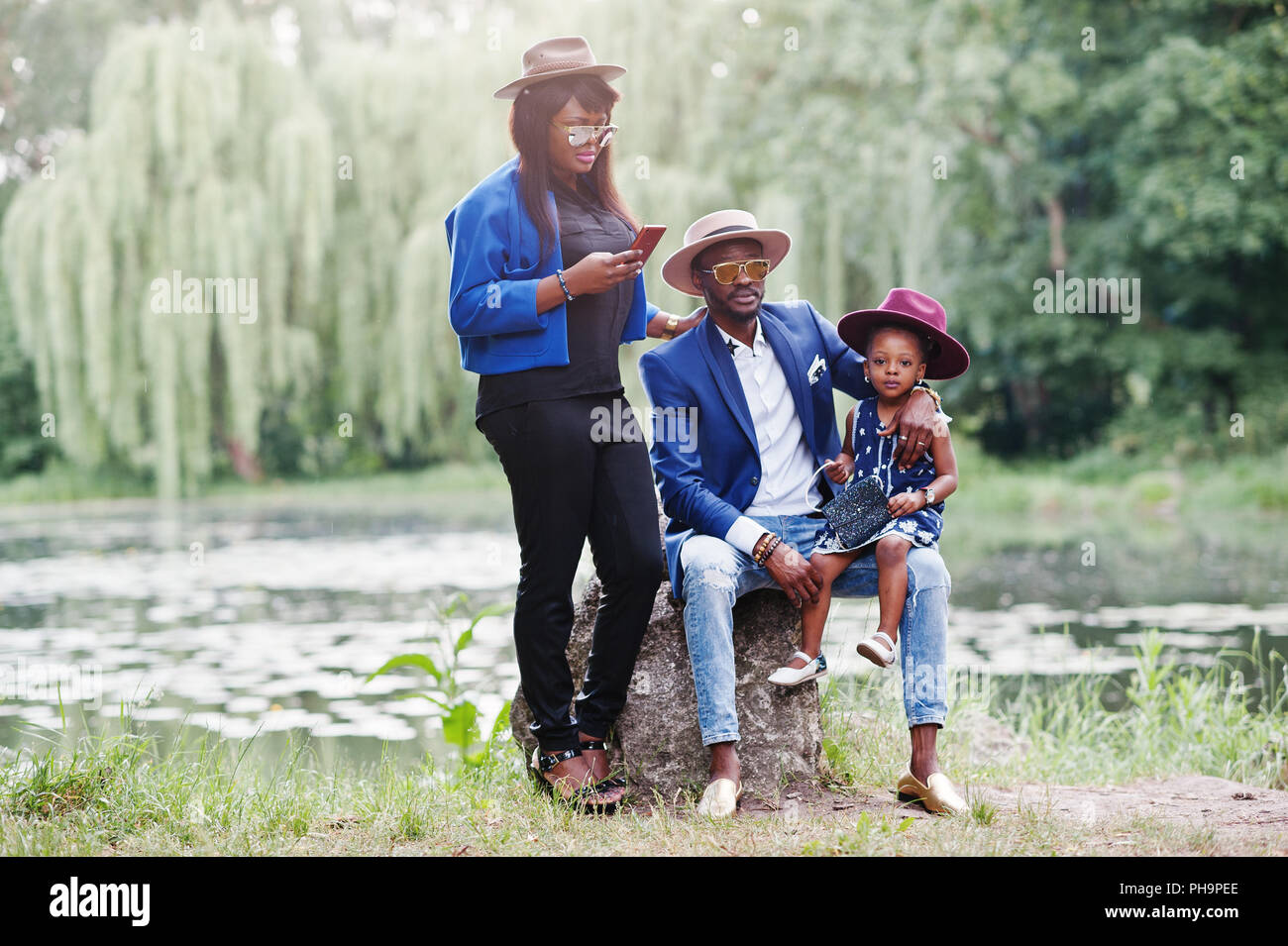 Stylish and rich african american family Stock Photo - Alamy
