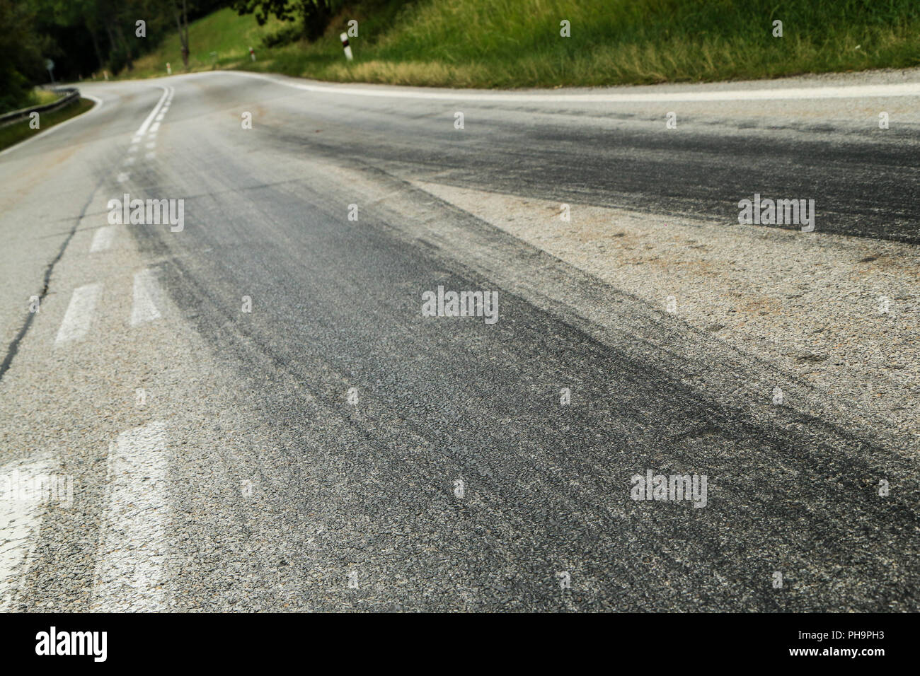 The rubber tracks from the racing cars left on the tarmac at the start ...