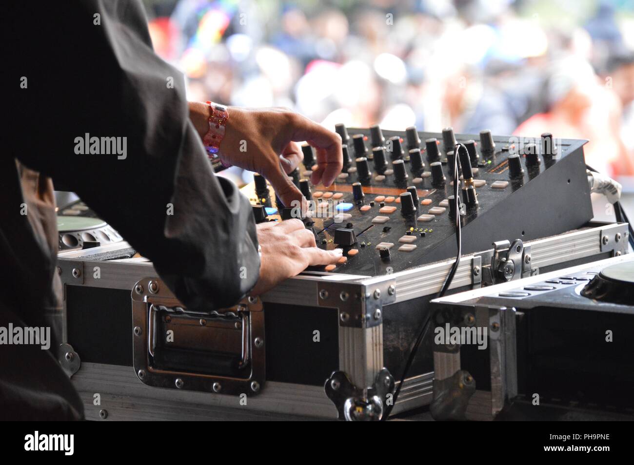 Dj performing on equipment Stock Photo - Alamy