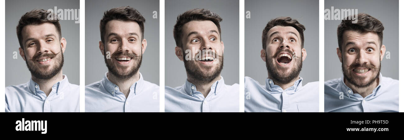 Set of young man's portraits with different happy emotions on gray ...