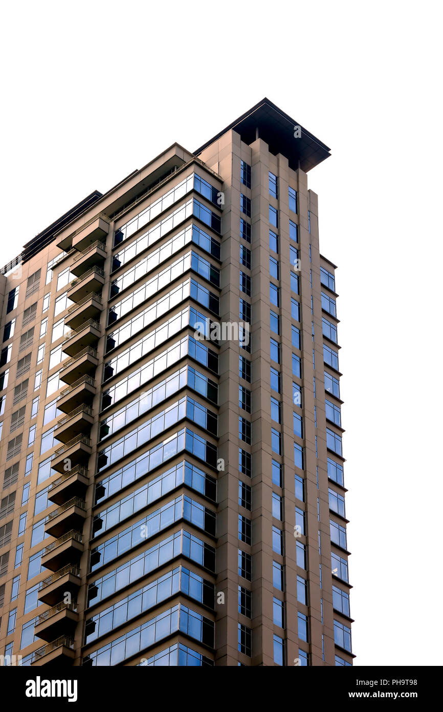 Glass windowed building on white isolated background. The building has ...