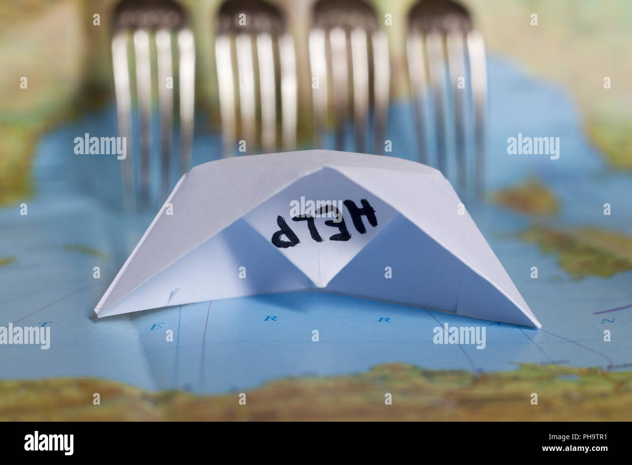 Paper Boat Map Fence Refugees Stock Photo - Alamy